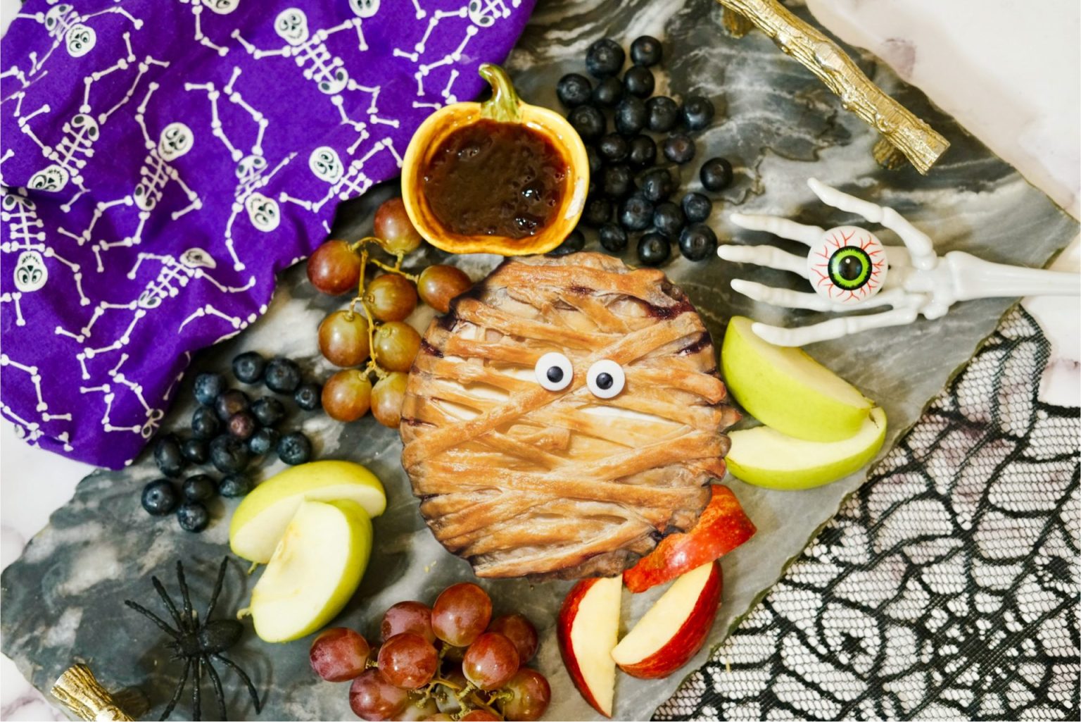 Mummy Baked Brie - Cocktails and Appetizers